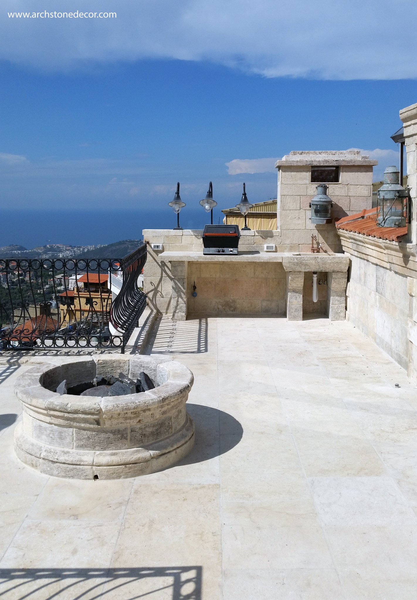 Hand carved reclaimed French limestone fire pit ideas