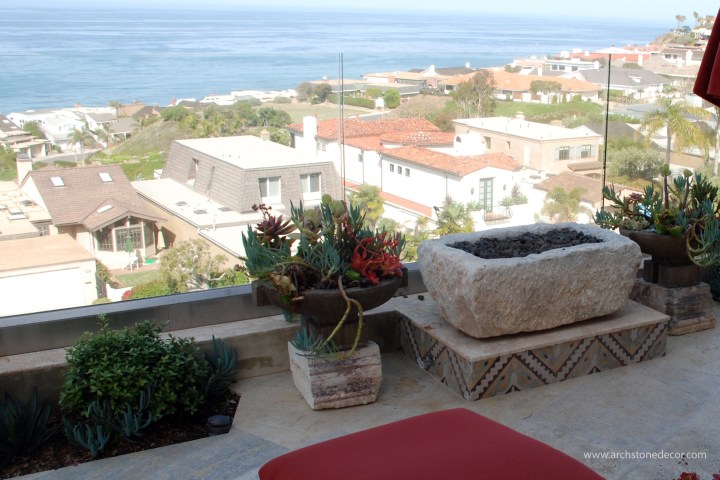 Hand carved reclaimed French limestone fire pit ideas