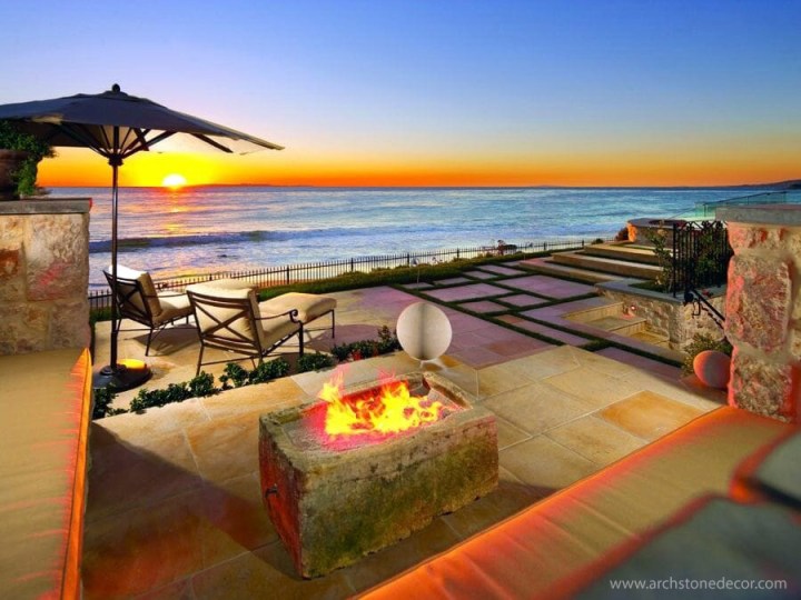 Hand carved reclaimed French limestone fire pit ideas